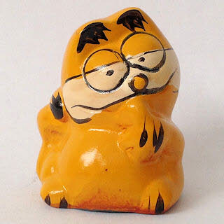 6 Different Garfield ceramic pencil sharpeners